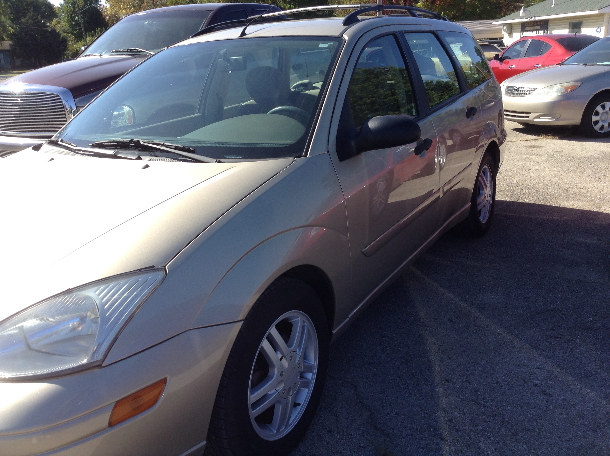 Gold, cloth interior, 4 cylinder, auto, front-wheel drive, 4 door, a/c ...