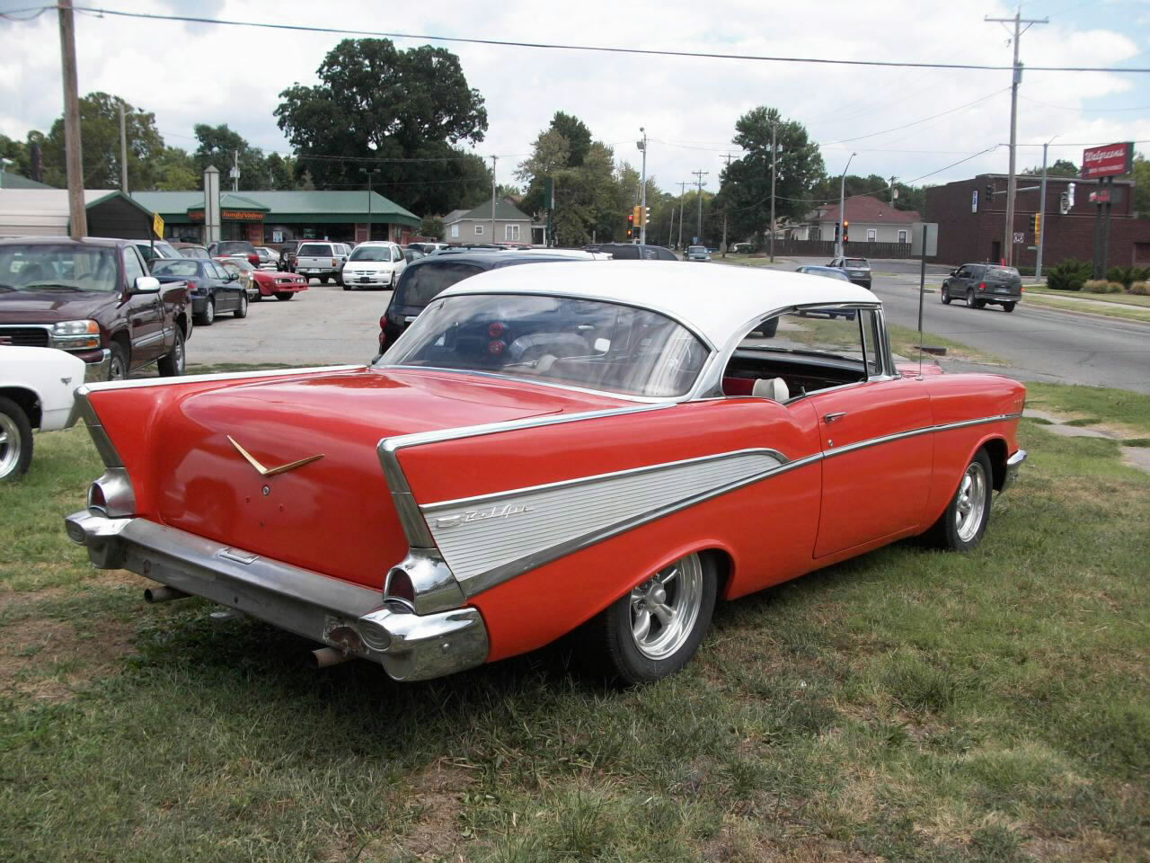 Red-orange & white, cloth interior, V-8 (59 Vette 283), 3 speed w ...