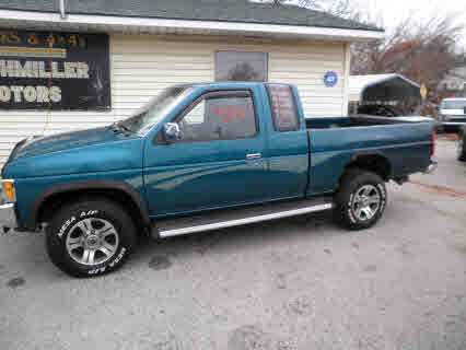 Green, grey cloth interior, 4 cylinder, 5 speed, 4x4, 2 door, a/c, tilt ...